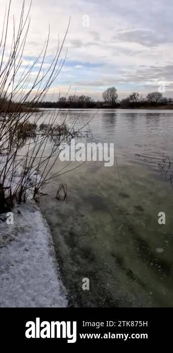 vertical video with landscape. vertical landscape with water. winter ...