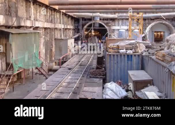 Cargo train in large huge ditch pit tunnel timelapse. Reinforcing ...
