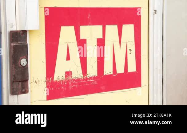 atm sign capital letters writing text on store door with customer ...