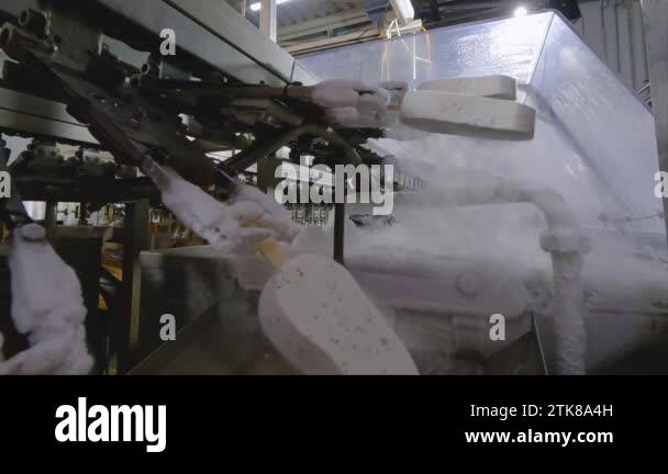 Freezing ice cream on the conveyor. Ice cream production process ...