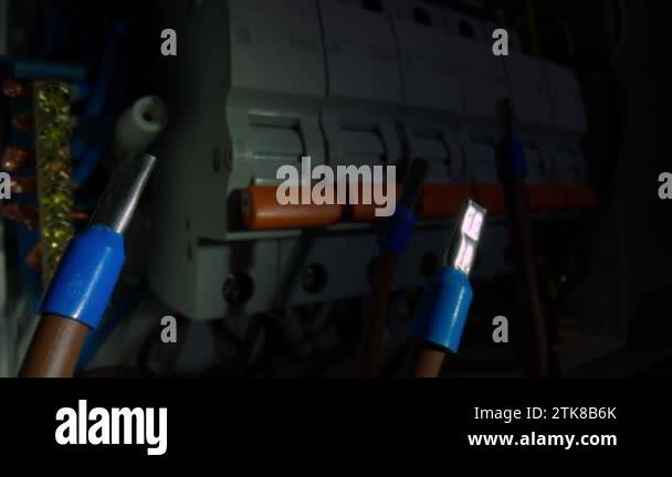 Macro shot of brown wires with blue bushing ferrules in the dark by ...