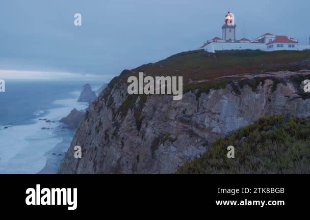 Beautiful dark evening panorama with farol lighthouse in the Atlantic ...