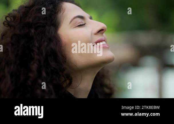 Spiritual woman opening eyes to sky with HOPE and FAITH. Girl smiling ...
