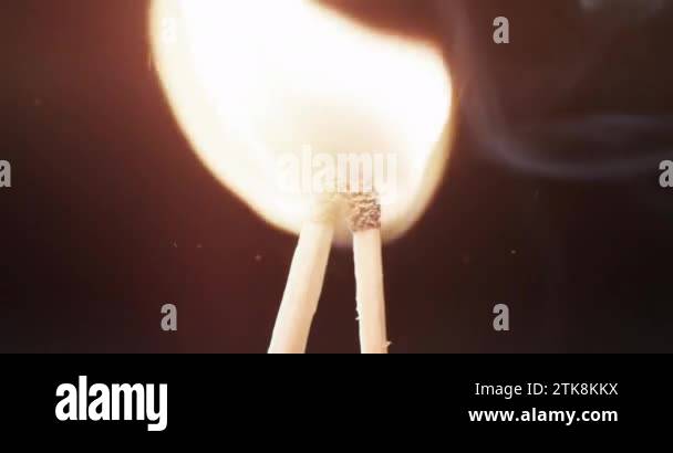 Video of matches with yellow fire flame and copy space on black ...