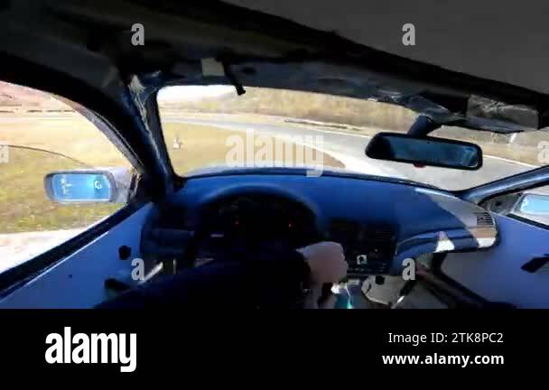 Dangerous kind of sport on training playground, driver inside the car ...