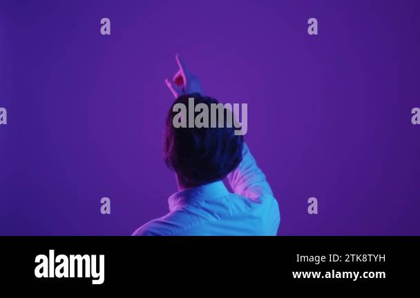 Invisible text. Searching man. Neon light portrait. Unrecognizable guy ...