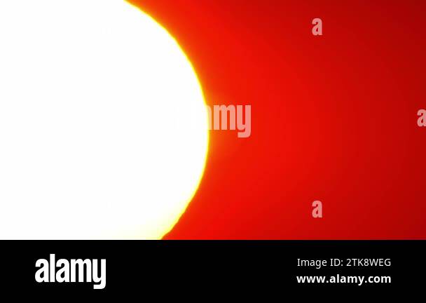 Sunset in the orange yellow red sky timelapse. Epic setting sun as big ...