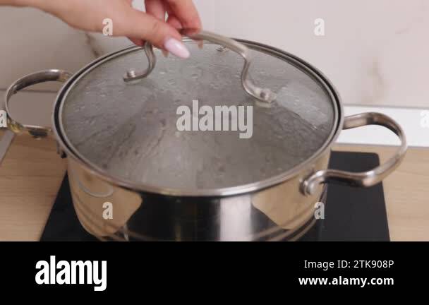 Boiling water, Stove boiling, Electric boiling. Preparation food in ...