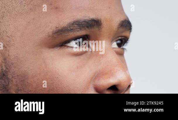 Closeup, thinking and man with ideas, eyes or problem solving on a ...