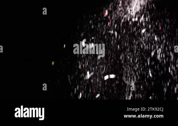 Stream of Falling Confetti, Dust Particles, and Snowfall on Black ...