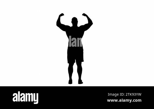 Black silhouette of a muscular man raising his arms up and ...