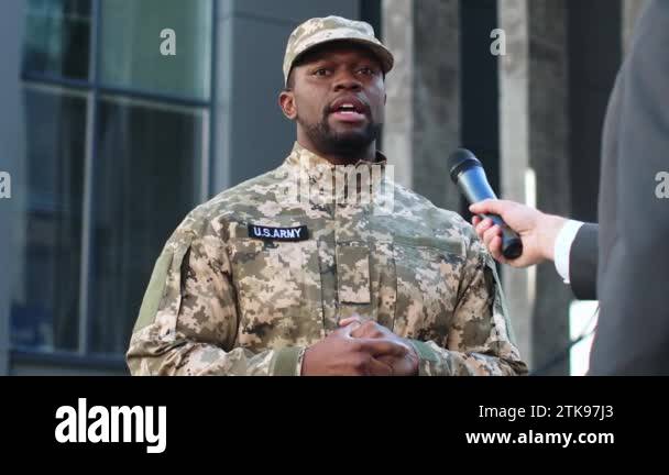 Defence army volunteer, African American soldier gives interview to TV ...