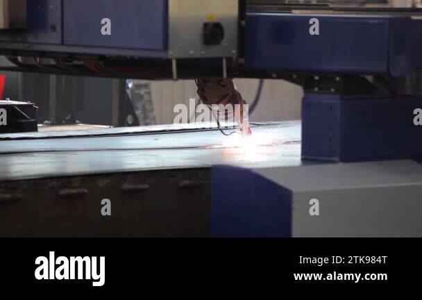 A plasma cutter making patterns from the metal sheet. The cutter ...