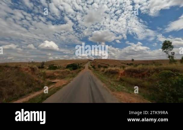 Car drive in devastated central Madagascar poor landscape, highland ...