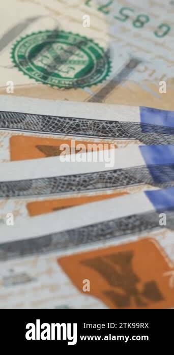 Close-up of a 100 dollar banknote. Camera movement over a 100 dollar ...