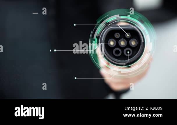 Focus EV charger pointing in front of camera display futuristic smart ...