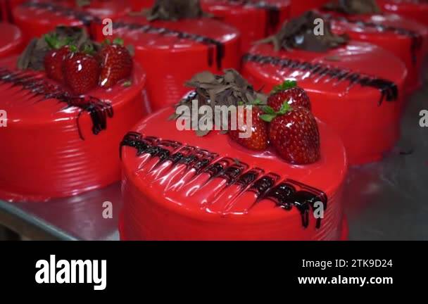 Cakes in the production process for the patisserie. Decorate cake with ...