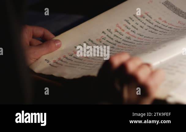 Clergy's Hands Are Leafing Through a Book Old Antique Book With Ancient ...
