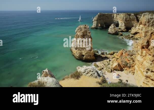 Spectacular aerial view of the cliffs and pillars on the sea, with ...