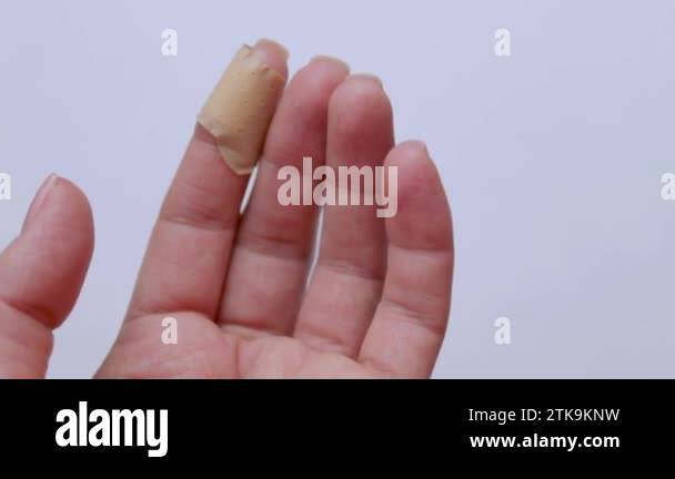 Wound on the finger of the hand after the band-aid. First aid for ...