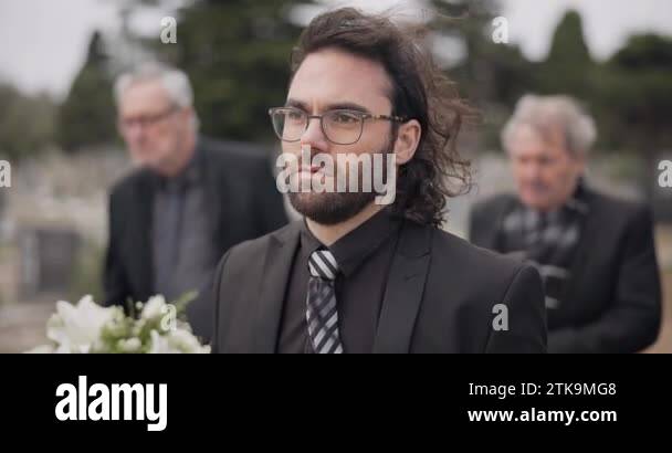 Funeral, death and man carry coffin with family in grief, mourning and ...