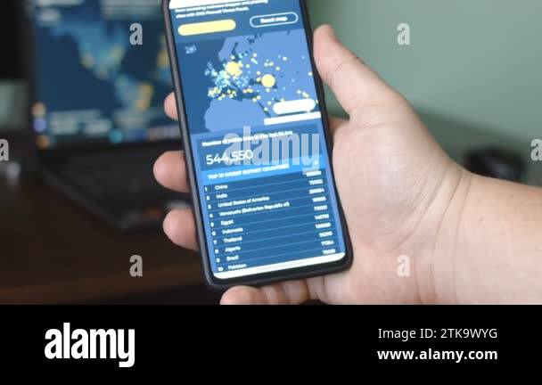 Cyber attack map navigation on smartphone. Displays Show Various ...