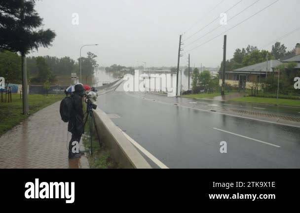 a cameraman records new windsor bridge under flood from the hawkesbury ...