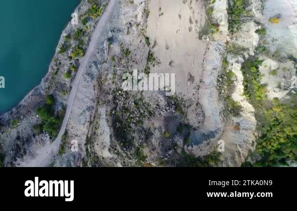 Aerial drone view of ATV quads on a dirt trail in forests. Off-road ...