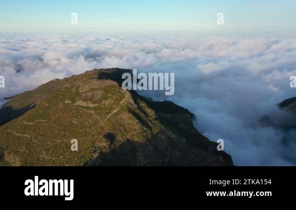 Gigantic drone aerial view over Pico Ruivo with a view of Pico do ...
