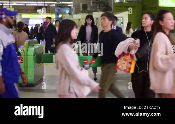 Shinjuku Ticket Gates in Tokyo Metro. Pasmo Card or Suica Card. People ...