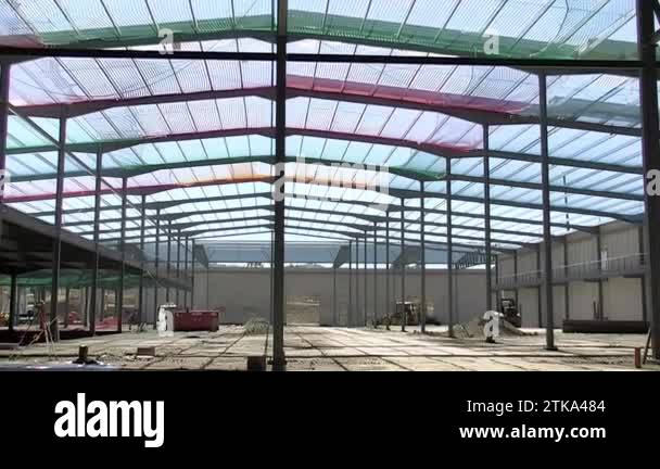 Structure of big industrial warehouse in construction Stock Video ...