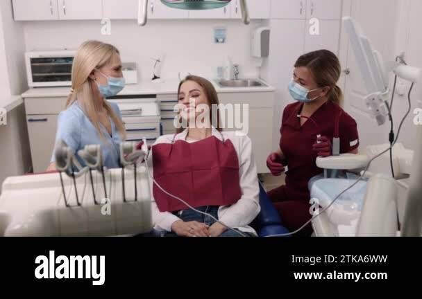 Dentist checking, oral hygiene, dental examination. Intraoral camera is ...