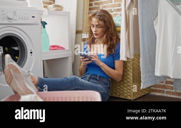 Young woman washing clothes using Stock Videos & Footage - HD and 4K ...