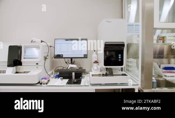 Blood Testing Machine Checks Samples In A Laboratory Room. Automated ...