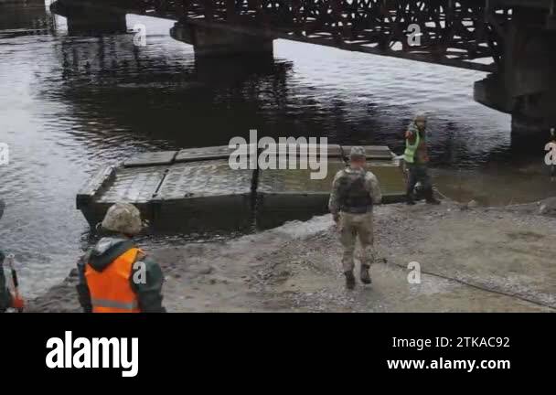 Pontoon bridge of the Ukrainian army. Installation of a temporary ...