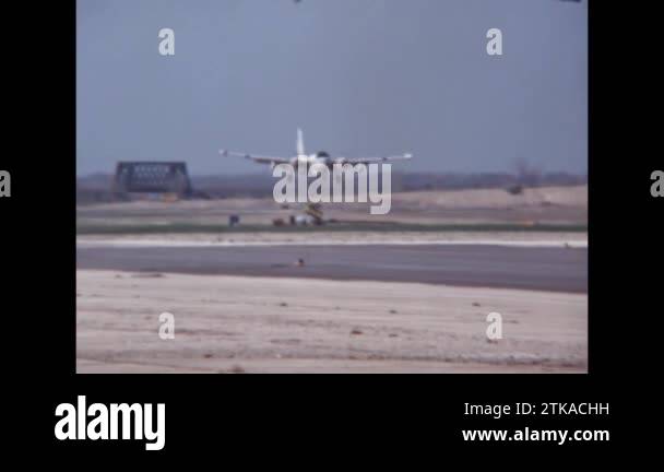 Airplane of United States Navy lands in Naval Air Station NAS. Lockheed ...