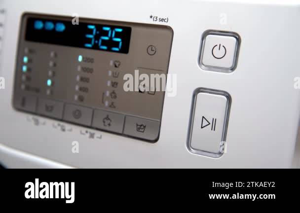 Presses the button to turn on the washing machine to the power supply ...