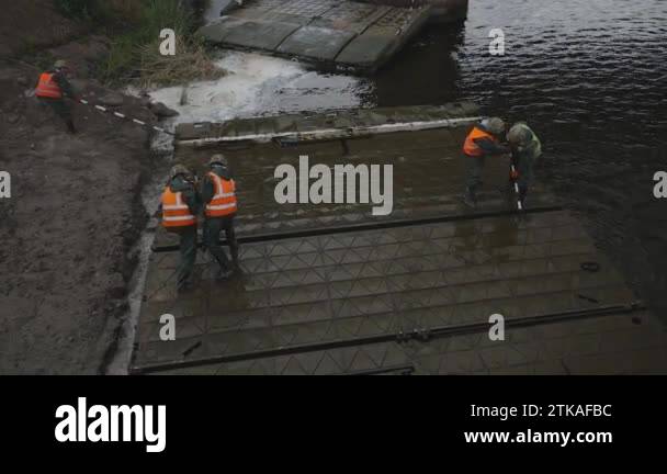 Pontoon bridge of the Ukrainian army. Installation of a temporary ...