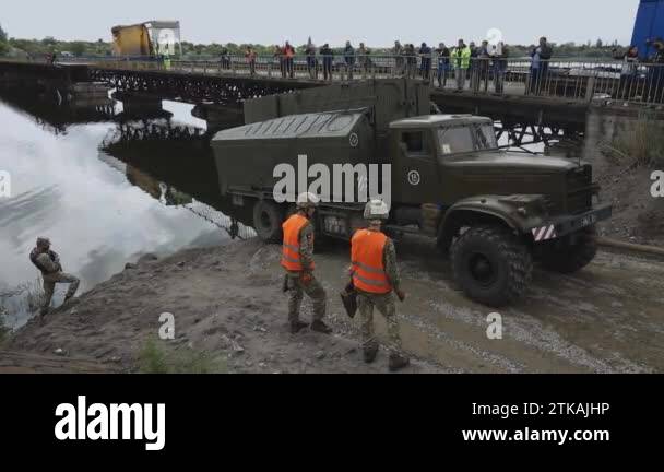 Pontoon bridge of the Ukrainian army. Installation of a temporary ...