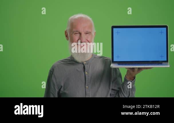 Green Screen.Portrait of an Old Man with a Laptop with a Blue Screen ...