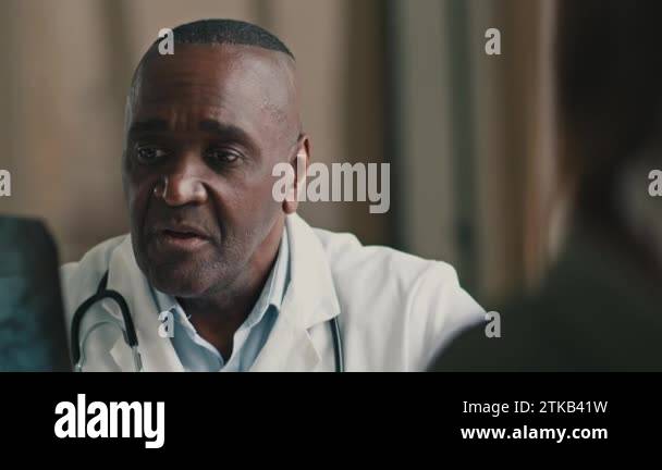 Radiologist african american man doctor surgeon look at roentgen ...