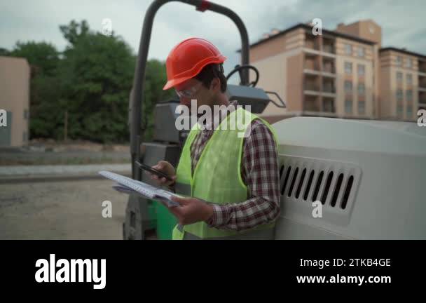 Engineer checking building documentation Stock Videos & Footage - HD ...