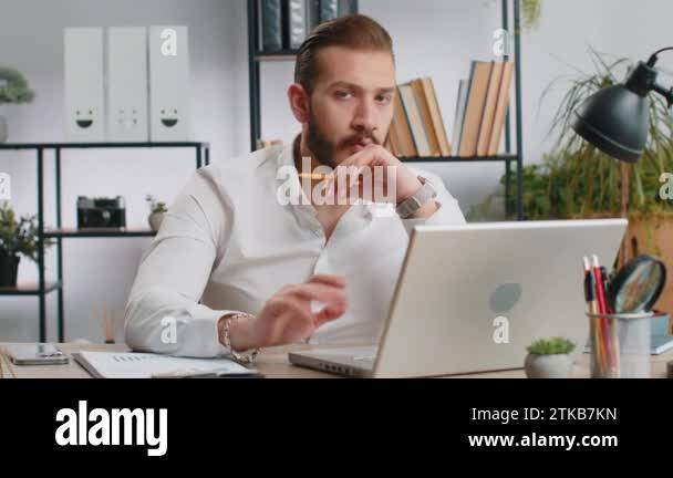 Stop. Lebanese businessman working on laptop, warning of finish ...