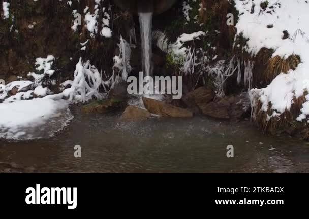 Concrete run-off pipe discharging water. Drain pipe, drainage. Runoff ...