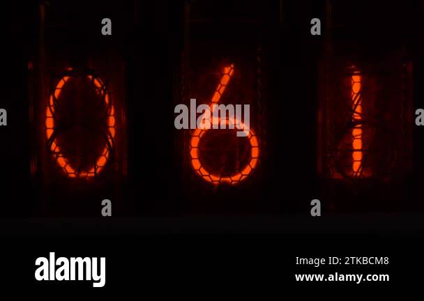 Retro vacuum tube display on the device counts seconds. Displaying ...