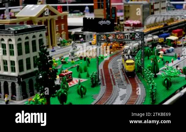 a city completely made of Lego blocks houses cars streets trains trams ...