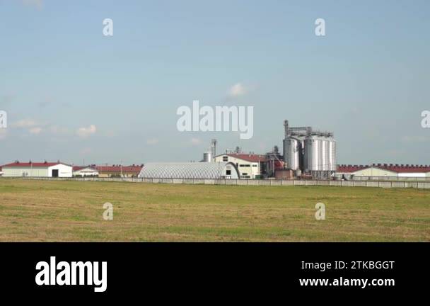Agriculture factory on modern farm. Industrial agriculture plant on sky ...