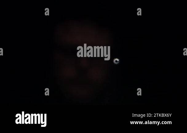 man face programmer reflection in dirty monitor loading bar soft focus ...