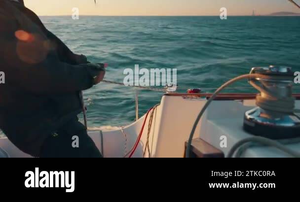 Sailing, boat and hands of captain with rope at sea for travel ...