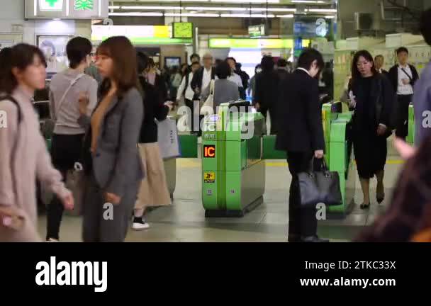 Shinjuku Ticket Gates in Tokyo Metro. Pasmo Card or Suica Card. People ...
